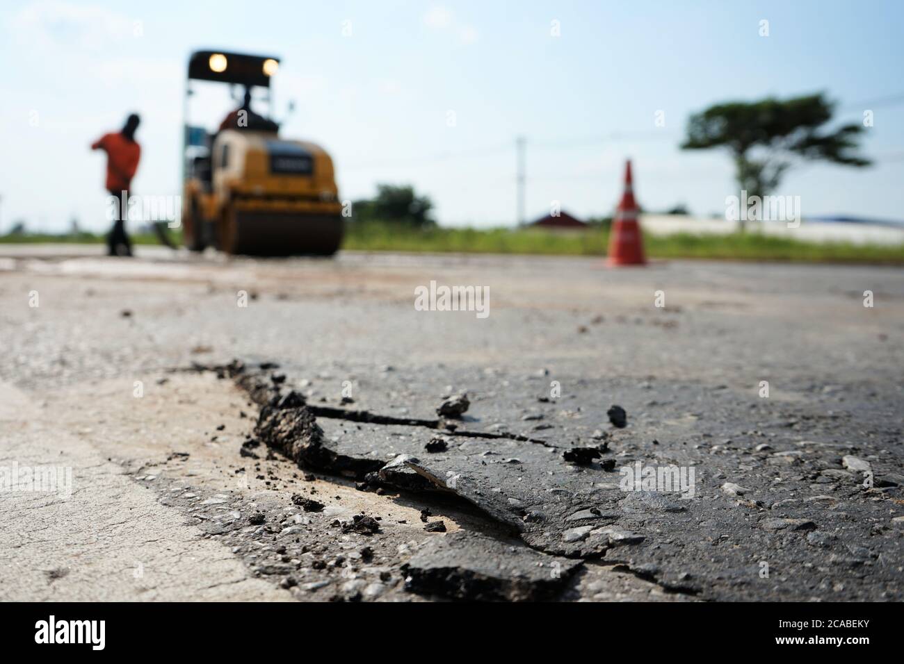 Repairing a damaged road For people to use the car to travel safely ...
