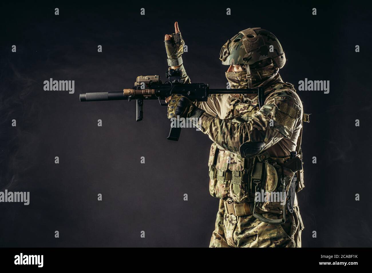 side view on soldier counting, expect shooting from weapon rifle gun ...