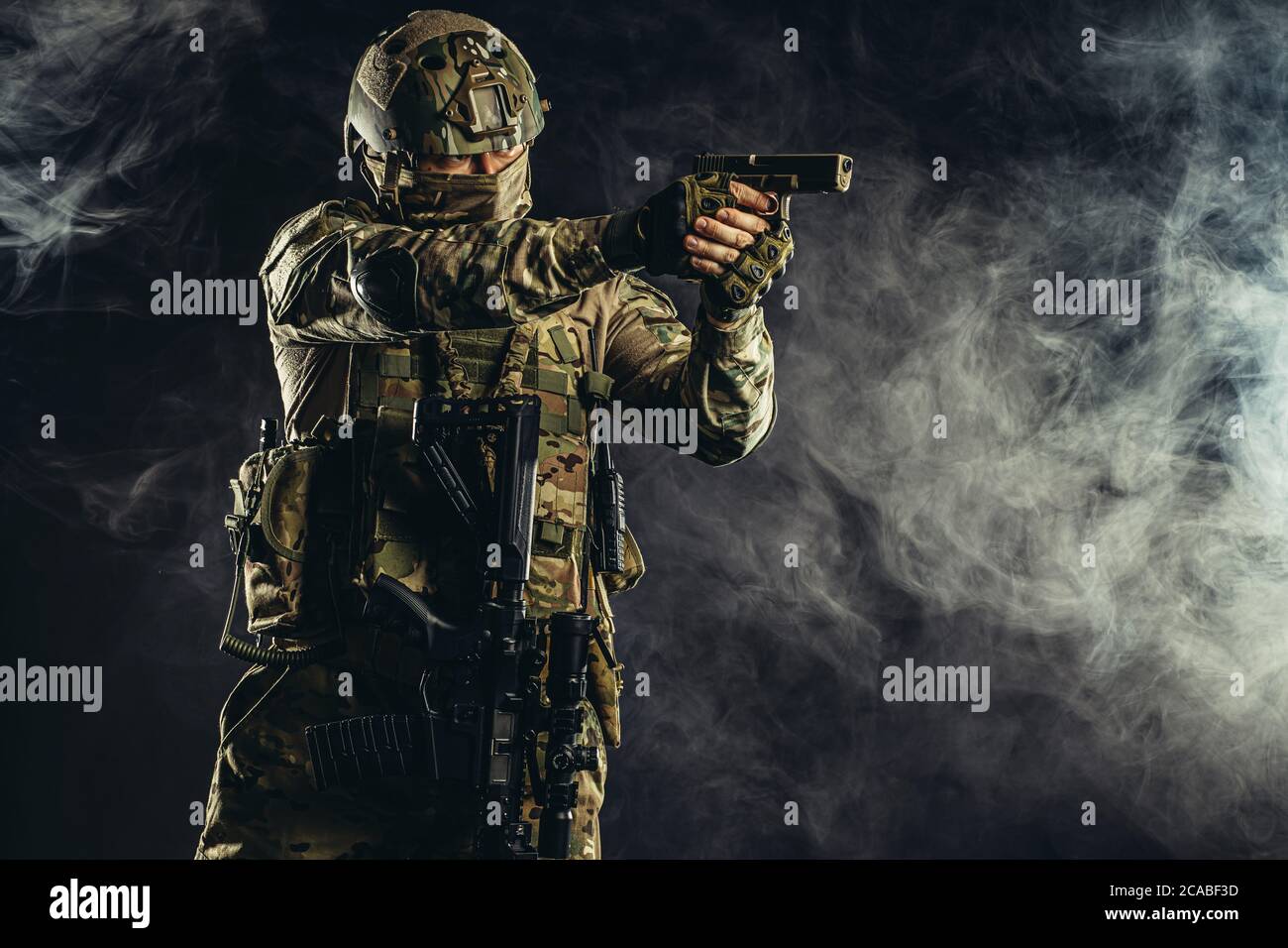 special forces soldier man holding machine gun and military equipment ...
