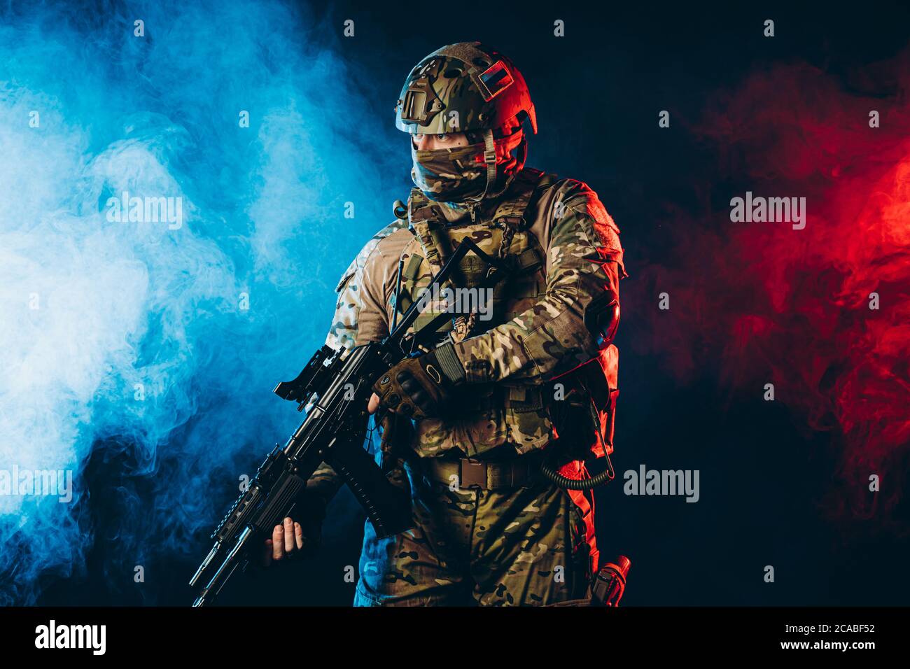 warrior military man wearing green uniform stand with gun rifle ...