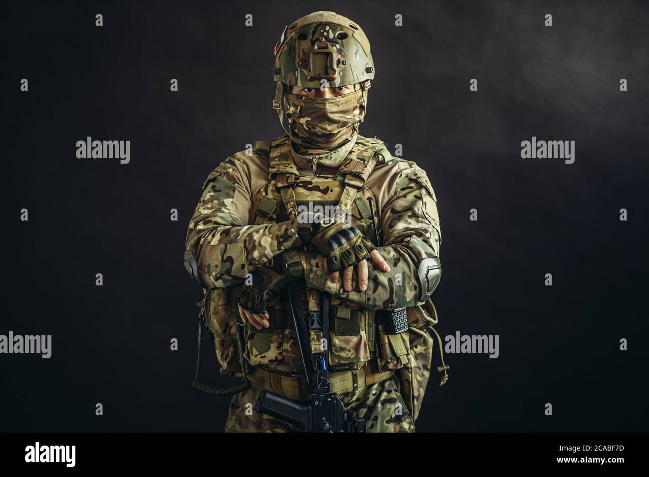 portrait of serious confident brave soldier in army wear, camouflage ...