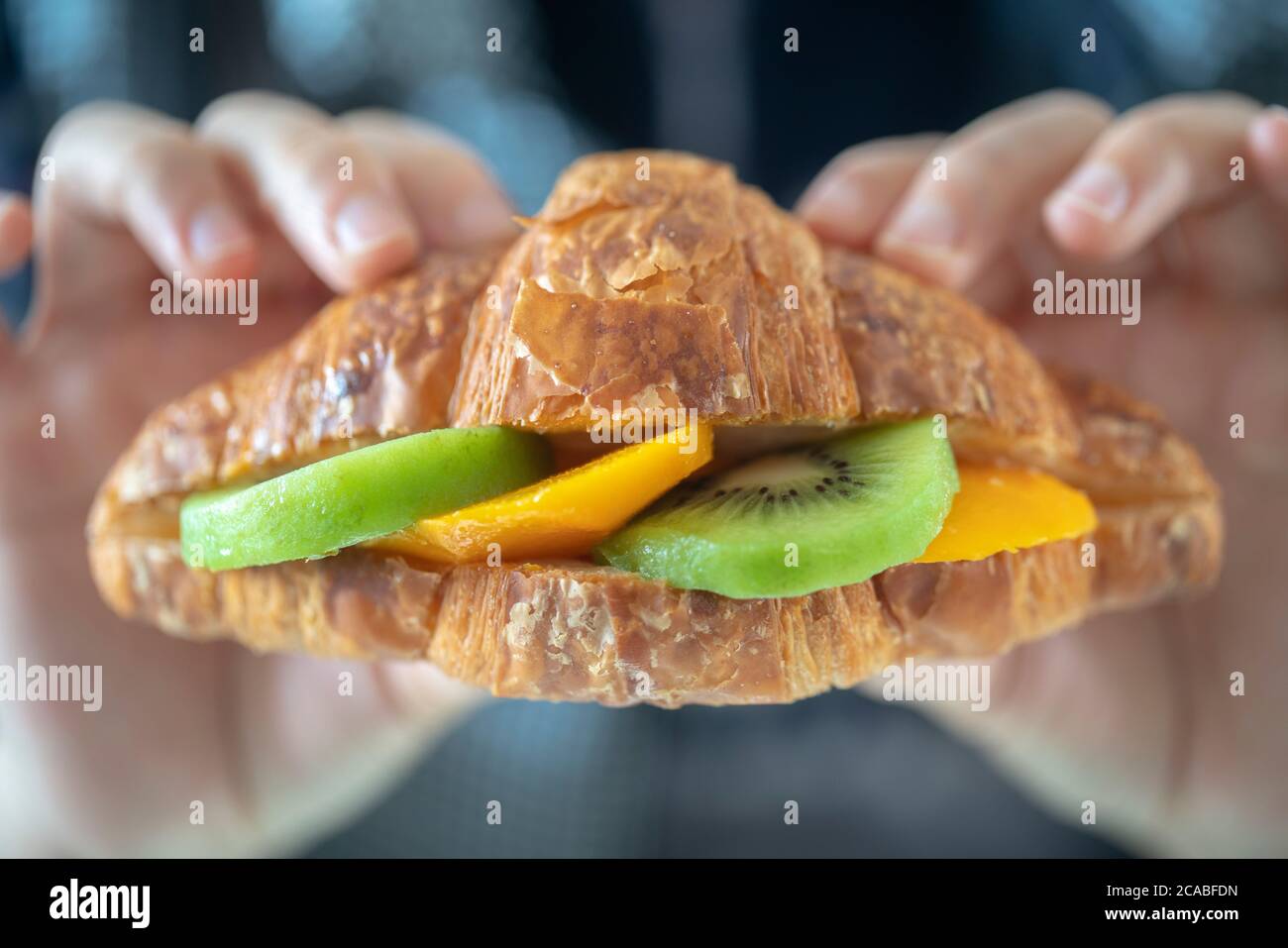 healthy breakfast: croissant sandwich with fruits Stock Photo - Alamy