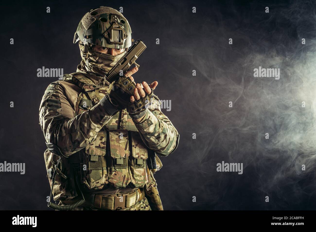 brave strong and confident man soldier wearing army clothes, green ...