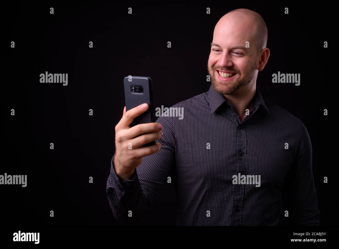 Portrait of happy handsome bald bearded businessman Stock Photo - Alamy Portrait of happy handsome bald bearded businessman Stock Photo - Alamy
