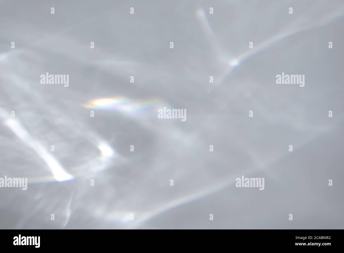 shadow and light caustic effect on a white wall Stock Photo - Alamy