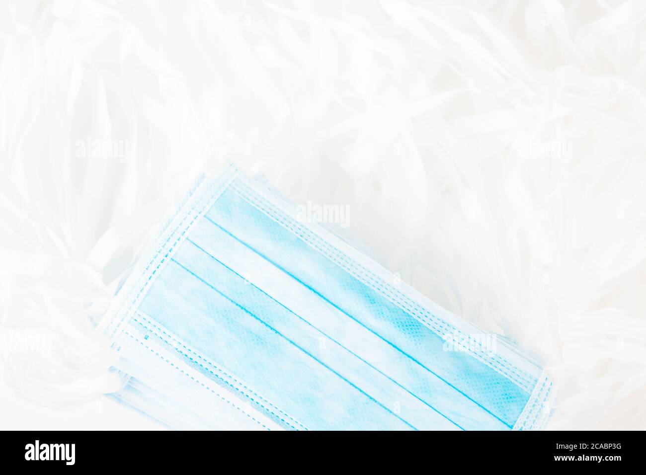 Bunch of fifty blue surgeon masks, used for covid 19. Against ...