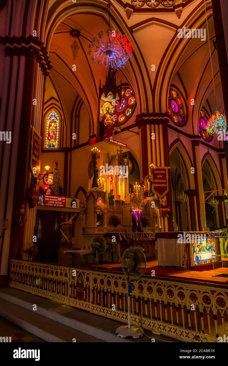 Interior of decorative church by night. Nice vibrant stained glass ...