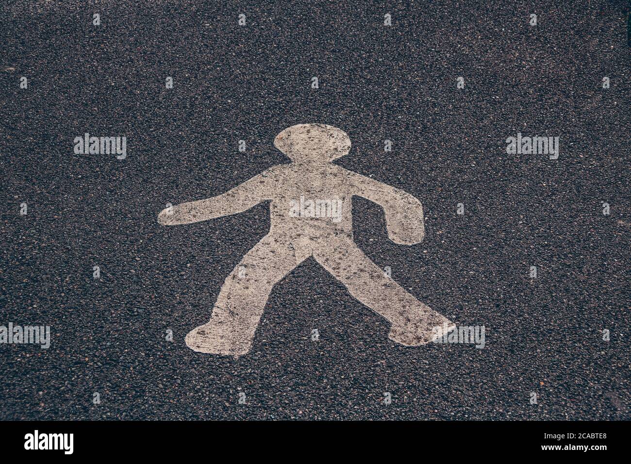 Signage character on the road Stock Photo - Alamy