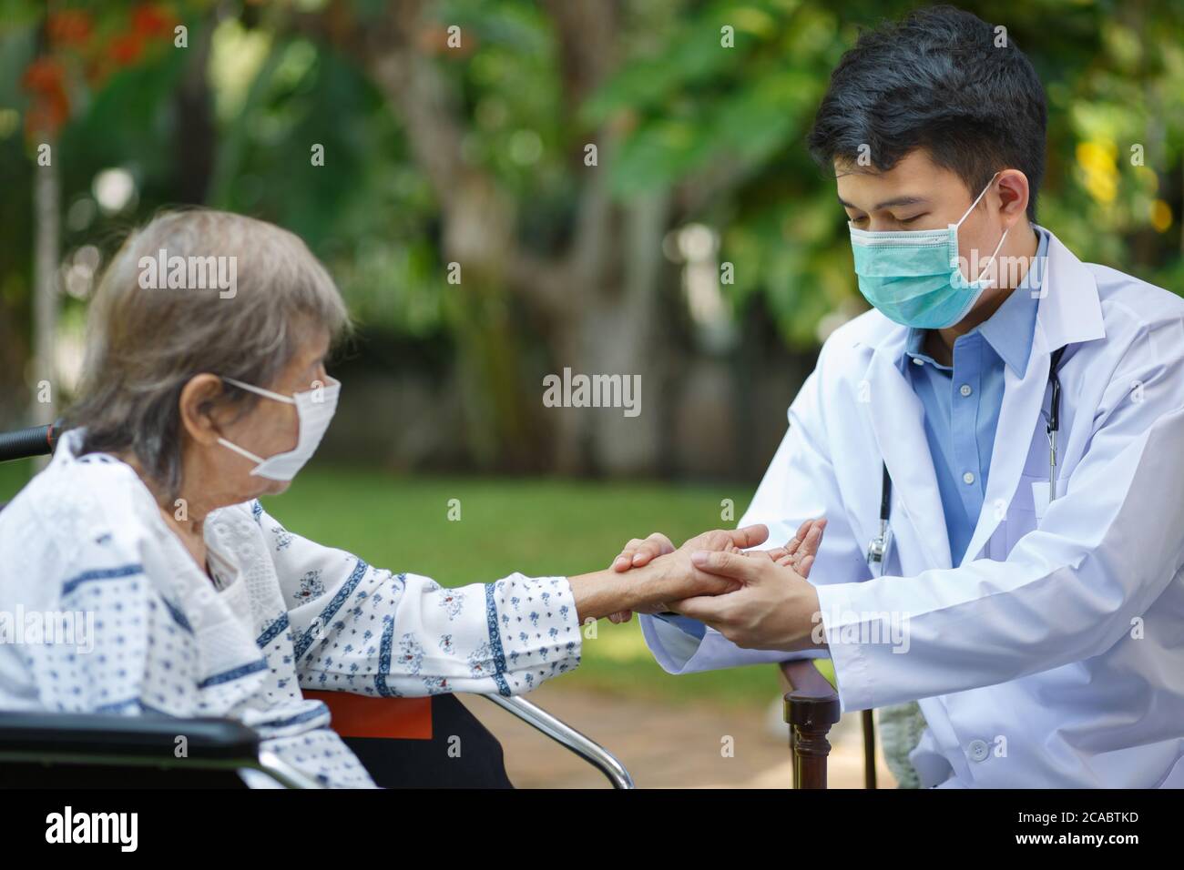 Doctor Check Heart Rate Pulse On Patient Wrist Stock Photo - Alamy