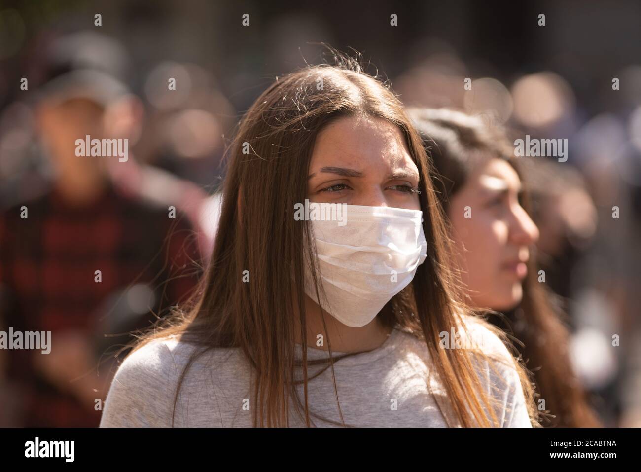 Girl with mask protesting hi-res stock photography and images - Alamy