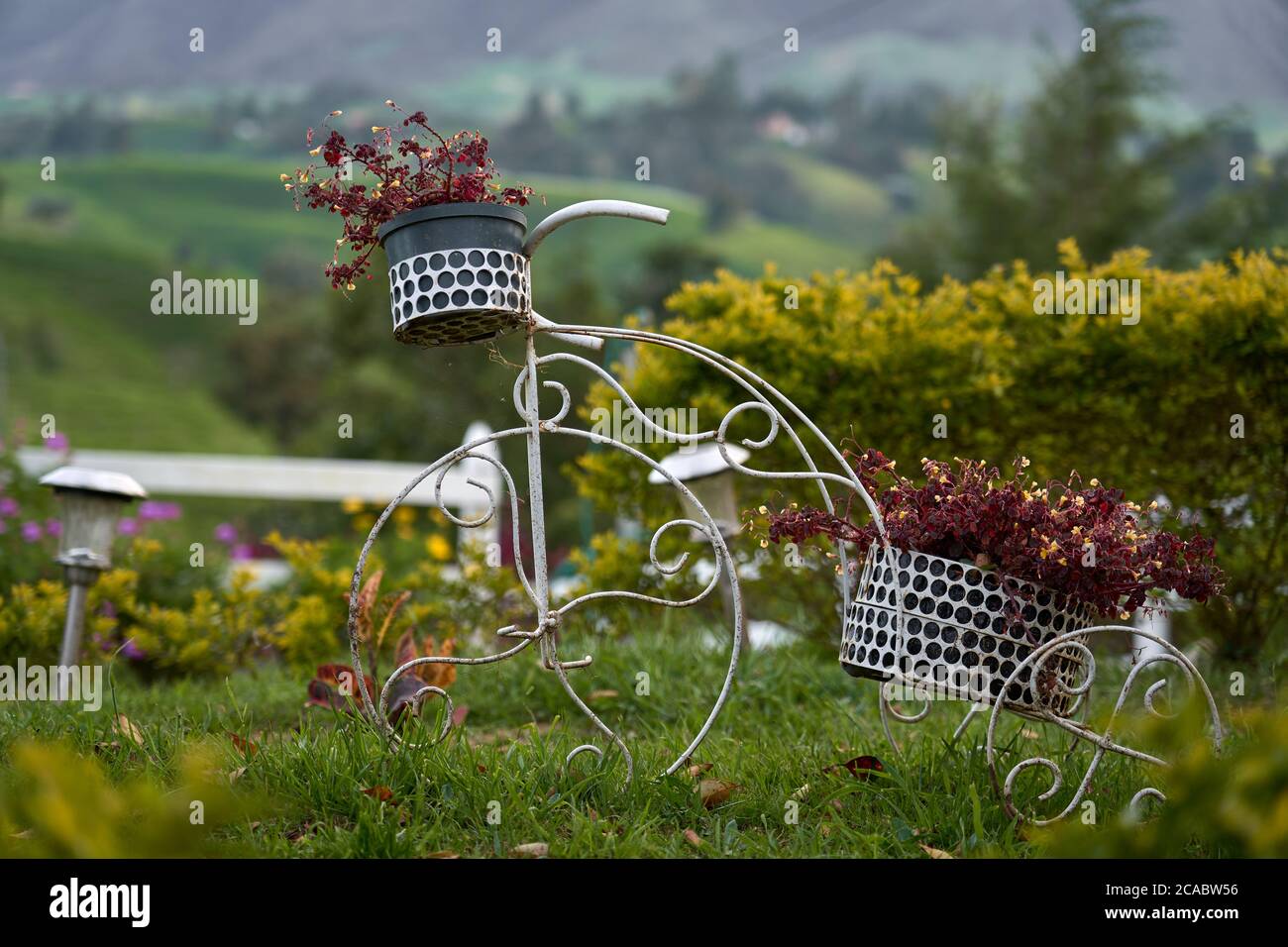Selective focus shot of a decorative flower stand in the shape of a ...