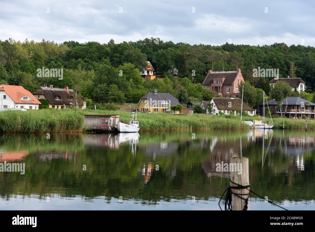 Seedorf, Germany. 02nd Aug, 2020. An old fishing boat lies in the ...
