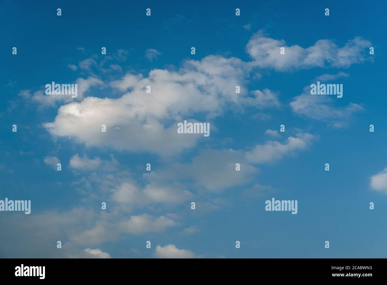 White clouds in blue azure sky. Summer good weather background Stock ...