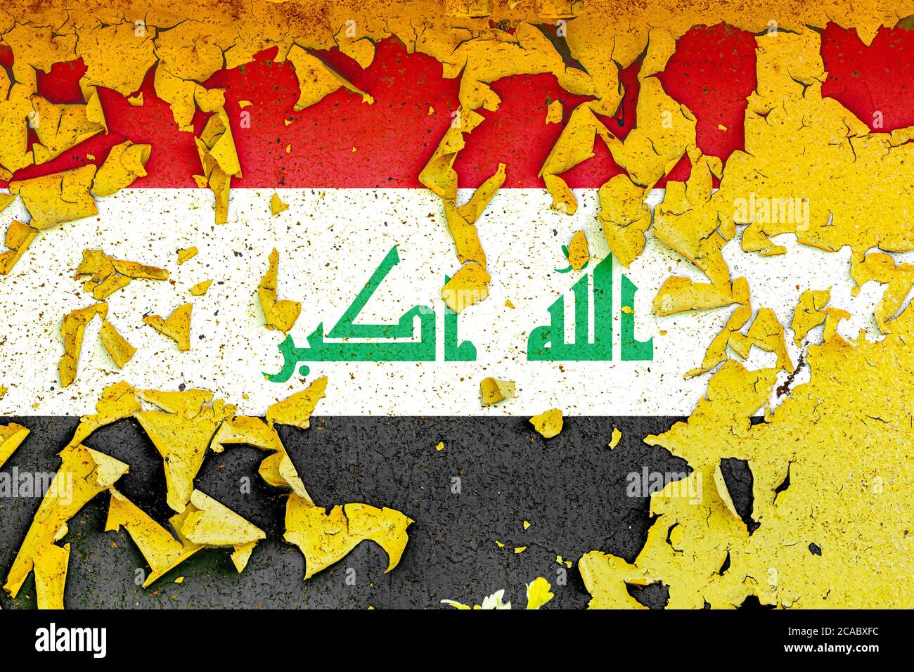The national flag of Irak is painted on an old metal wall with ragged ...
