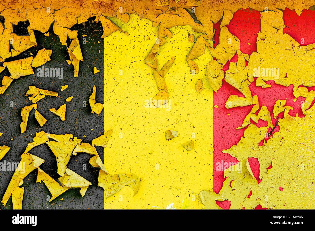 The national flag of Belgium is painted on an old metal wall with ...