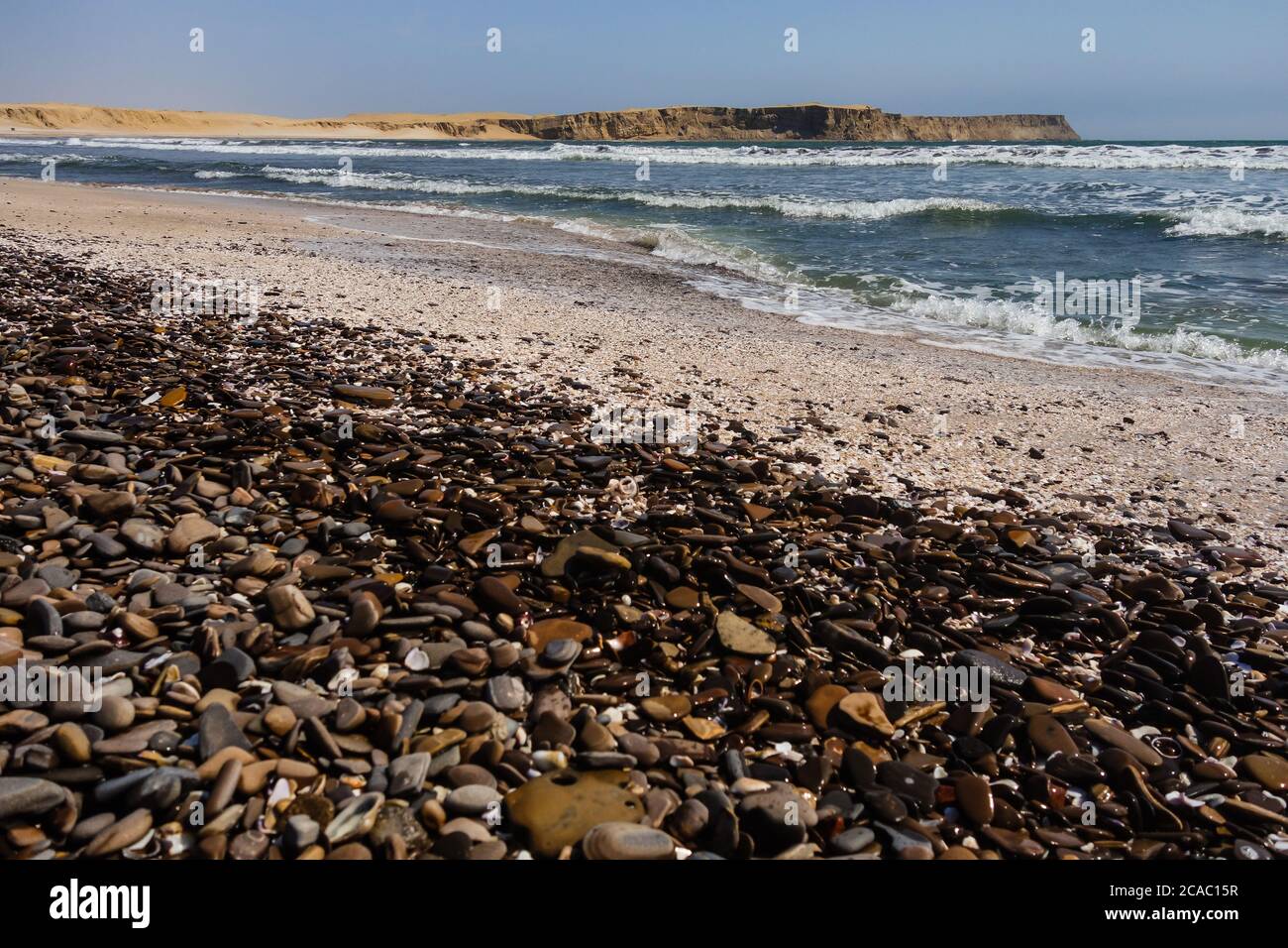 Scenic ocean with pebbly shore at the Paracas National Reserve and ...