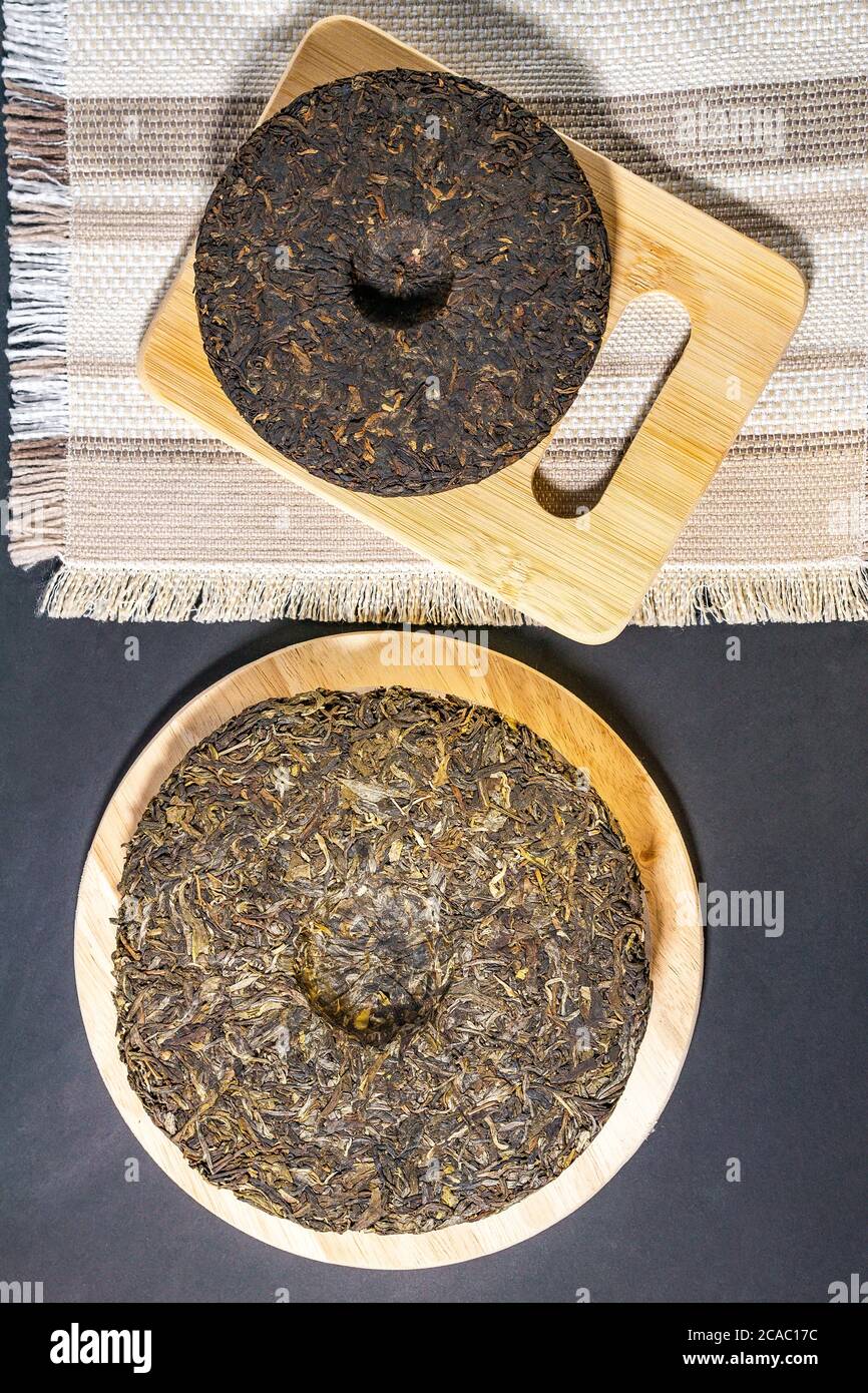 Chinese Tea Shu Shen Puer. Close-up. Pressed Tea. top view flat lay ...