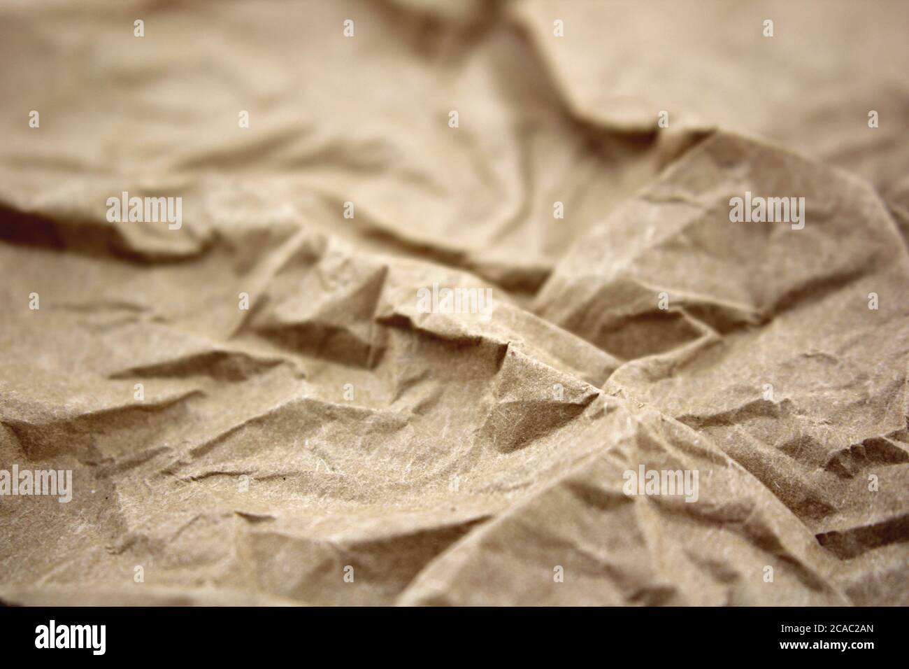 Macro Brown Crumpled Paper with faded edge Background Stock Photo - Alamy