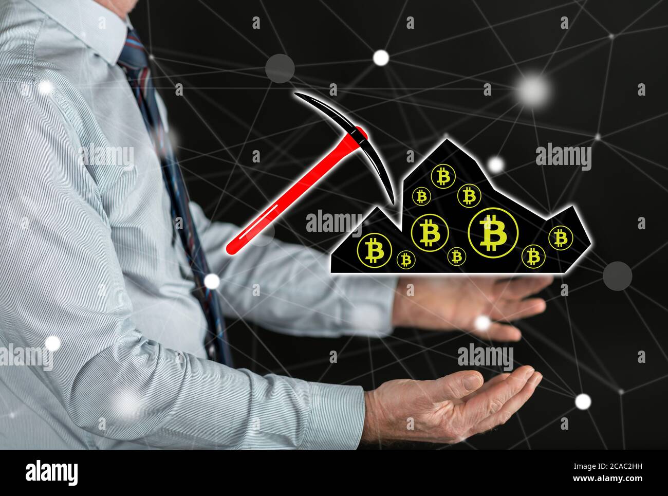 Bitcoin mining concept above the hands of a man Stock Photo - Alamy