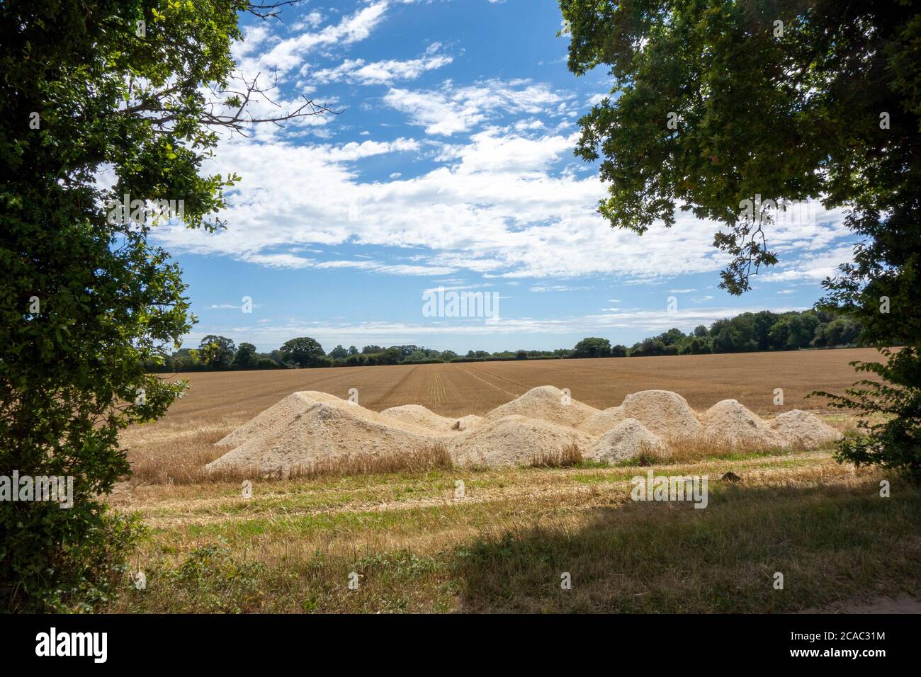 Pile of agricultural lime in field Stock Photo - Alamy