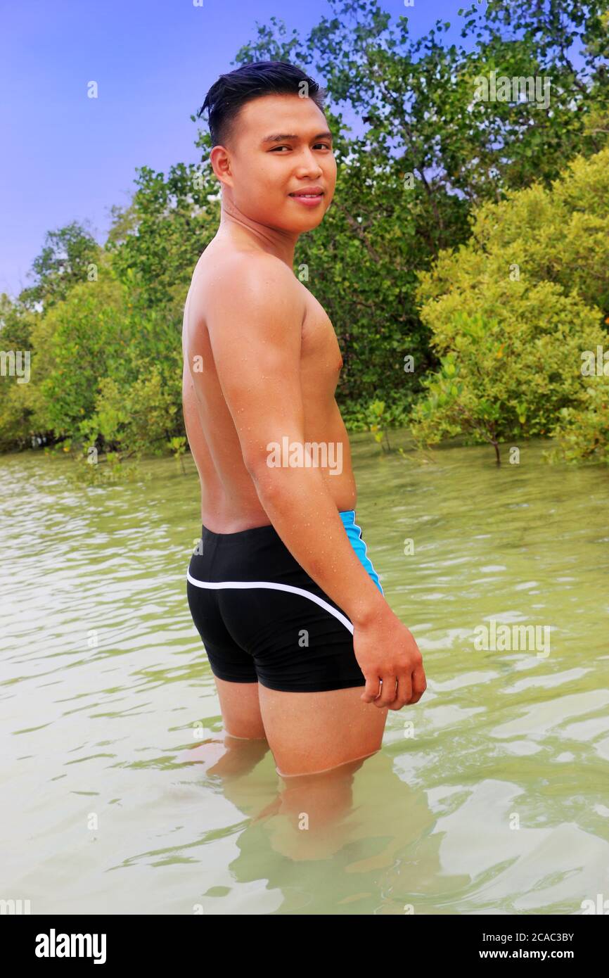 Female Model - Swimsuit | Male Model - Trunks Stock Photo - Alamy