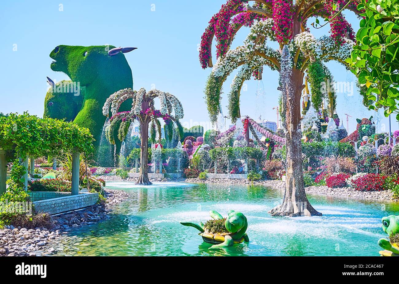 DUBAI, UAE - MARCH 5, 2020: Relax by the beautiful pond of Miracle ...