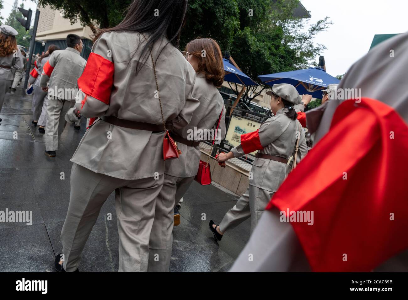 Members of the Chinese Communist Party walk to Tianfu Square to ...