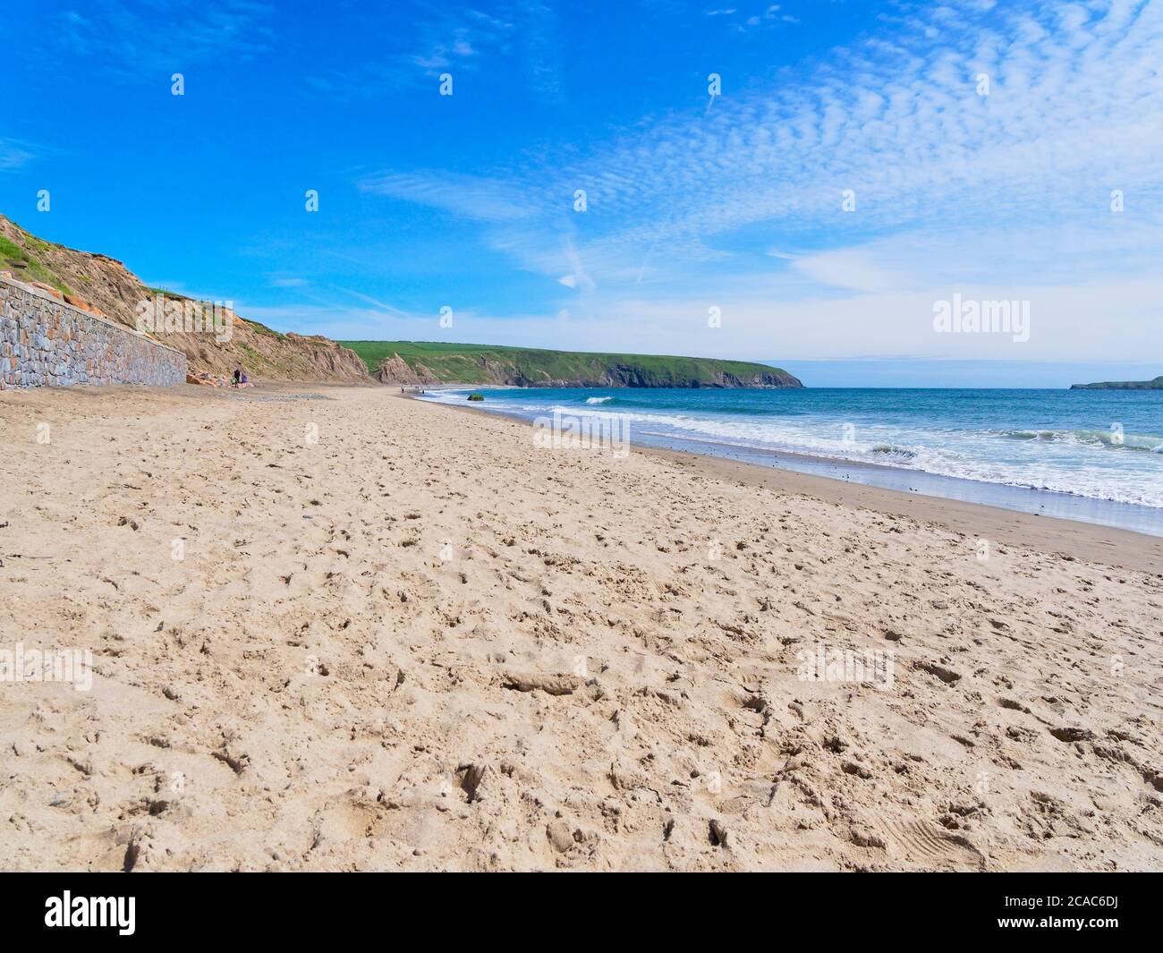 Only a few people on Aberdaron Beach in Wales on a beautiful late ...