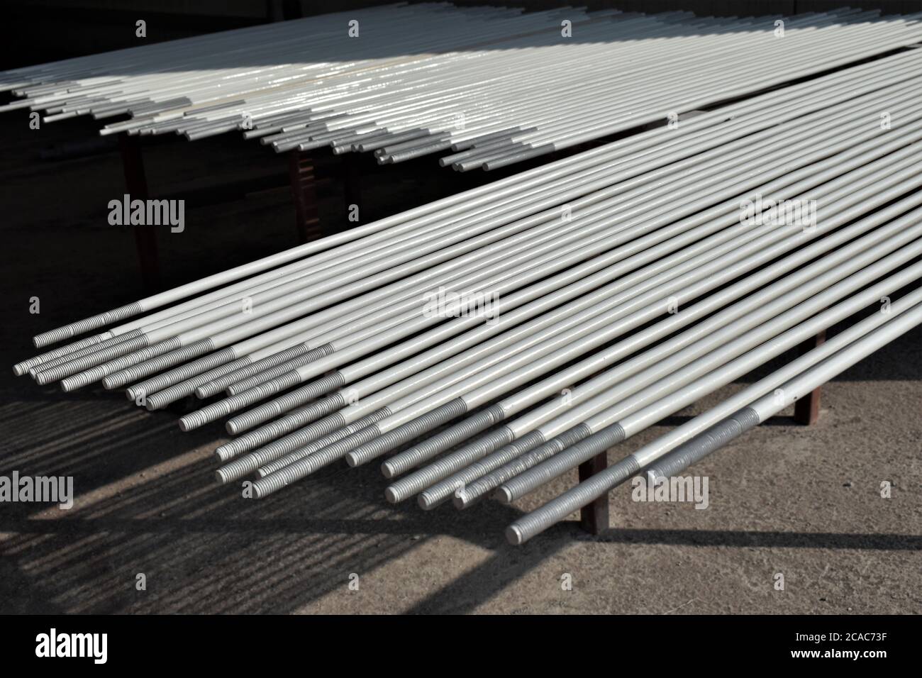 steel Structural parts. Threaded round bars in the paint shop . Sag rod ...