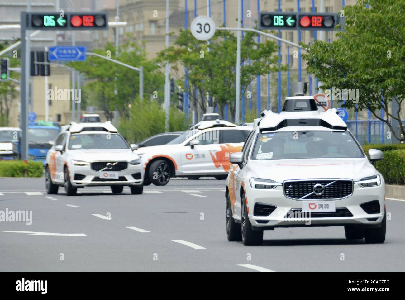 Self-driving taxis of Didi Chuxing run in Shanghai on July 1, 2020. The ...
