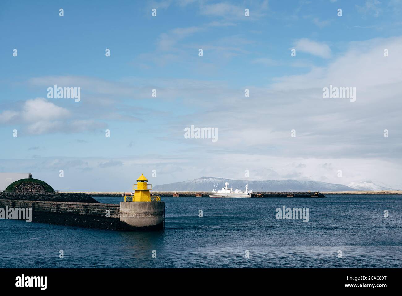 A large yellow lighthouse in Iceland, Reykjavik Stock Photo - Alamy