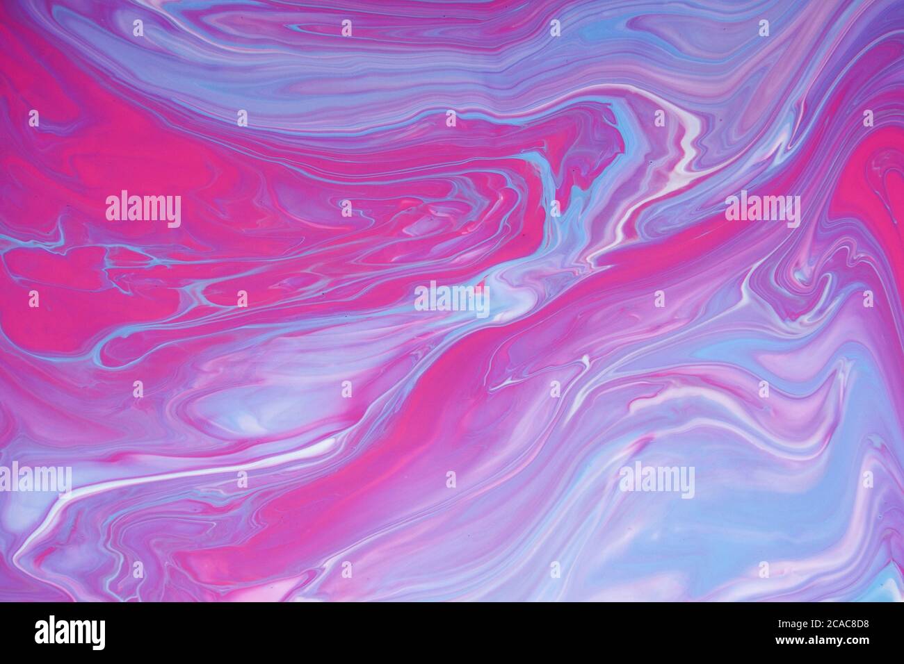Acrylic paint fluid in trend magenta and pink color mix background ...