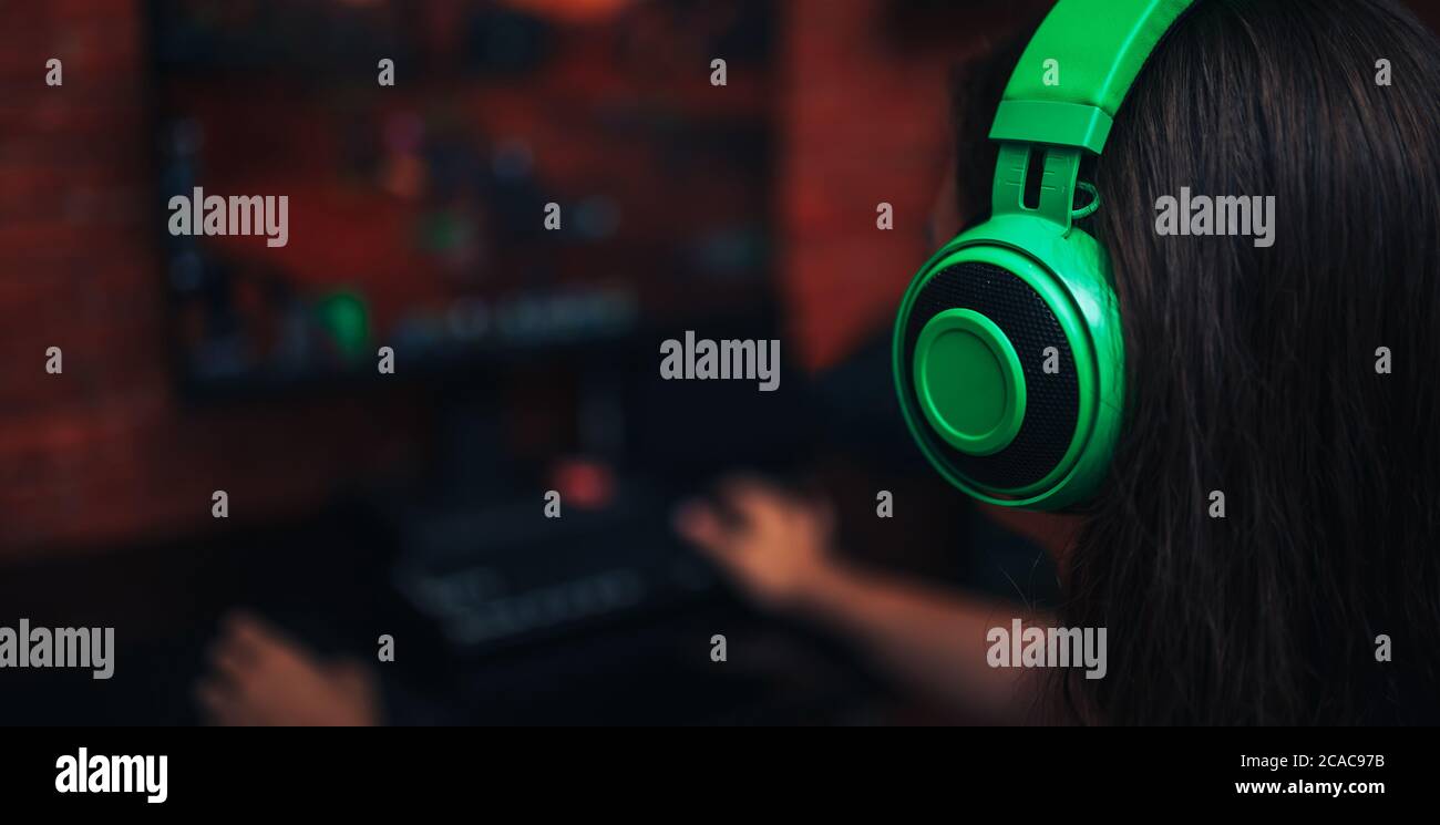 young girl playing game on computer, banner Stock Photo - Alamy