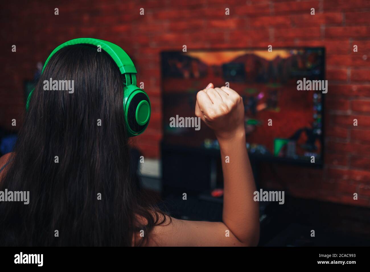 young girl playing game on computer, banner Stock Photo - Alamy