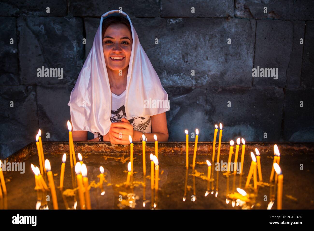 Tatev Monastery / Armenia - July 26, 2019: Armenian women with head ...