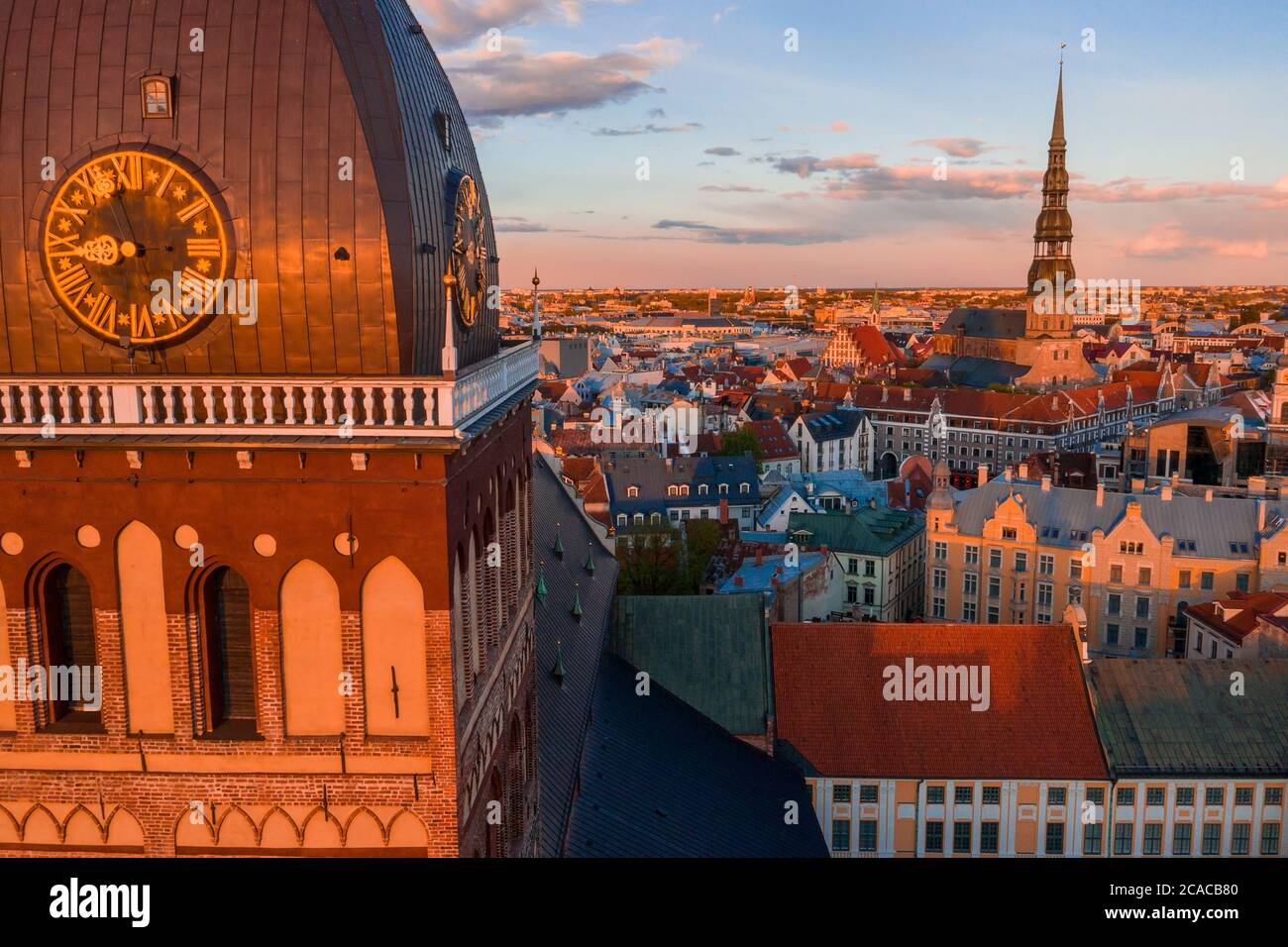 Aerial shot of Clock Tower in the beautiful Riga city Stock Photo - Alamy