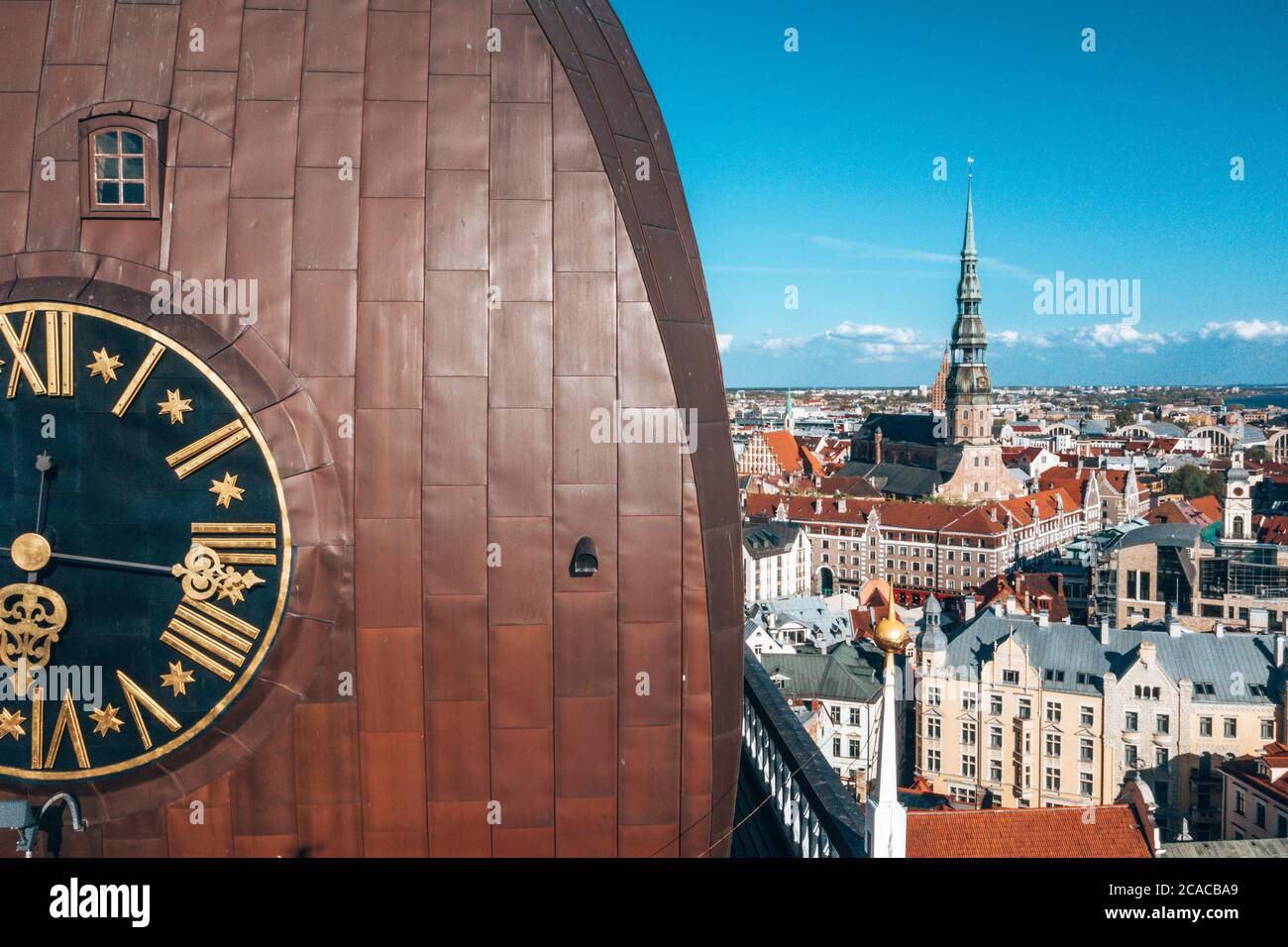 Aerial shot of Clock Tower in the beautiful Riga city Stock Photo - Alamy