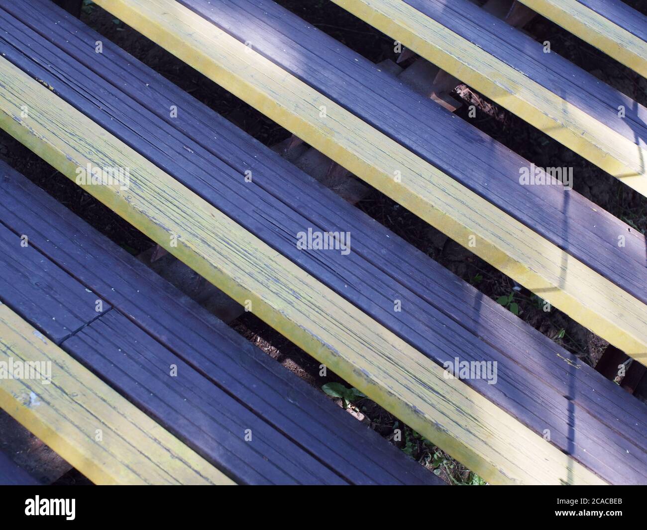 Parallel lines of wooden stair treadssun Stock Photo - Alamy