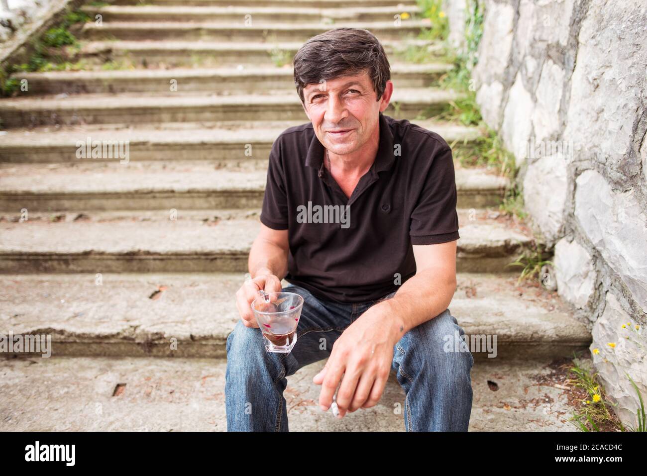 Man smoking cigarette drinking coffee hi-res stock photography and ...