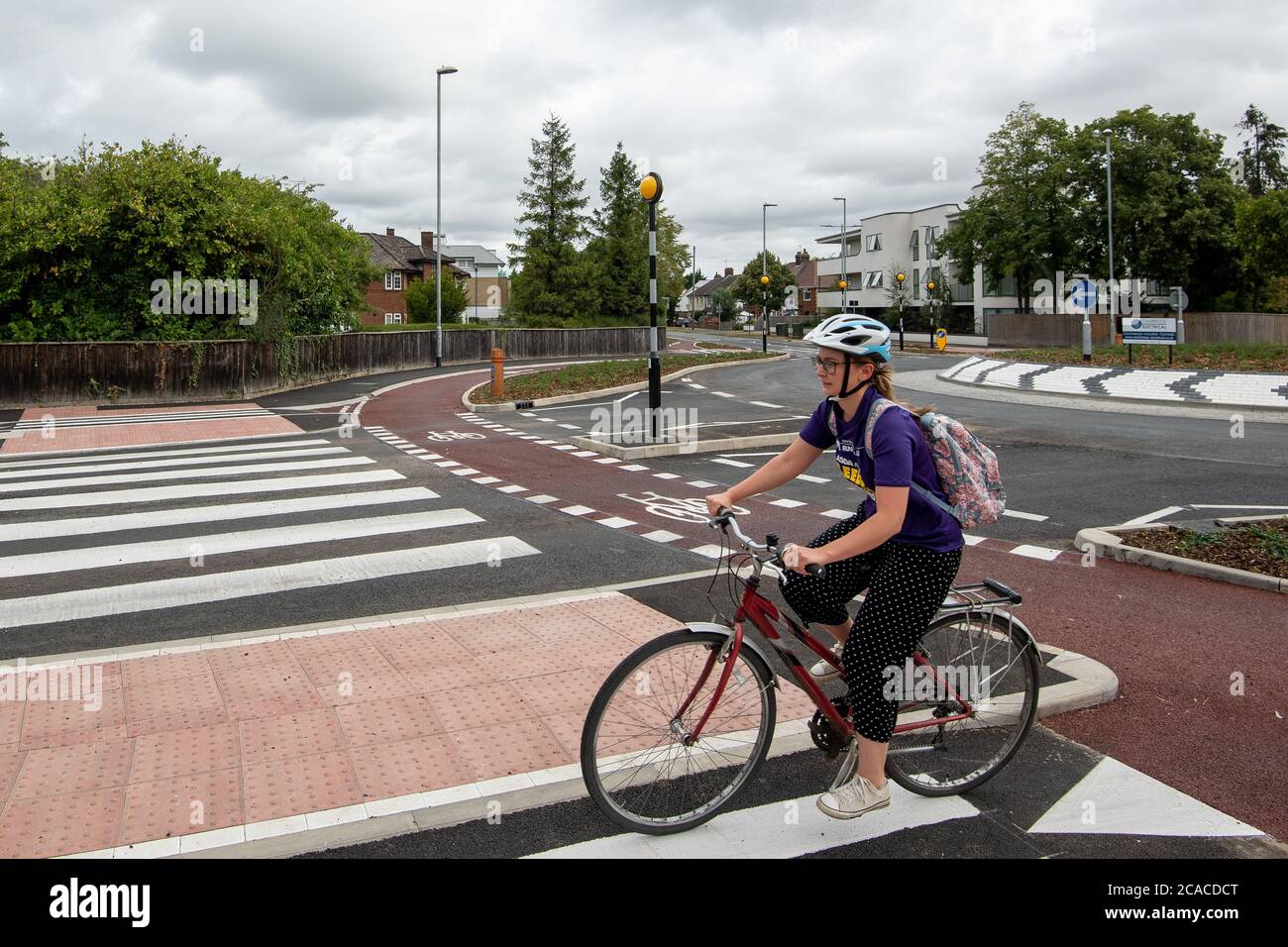 A cyclist uses uks first dutch style roundabout prioritises cyclists hi ...