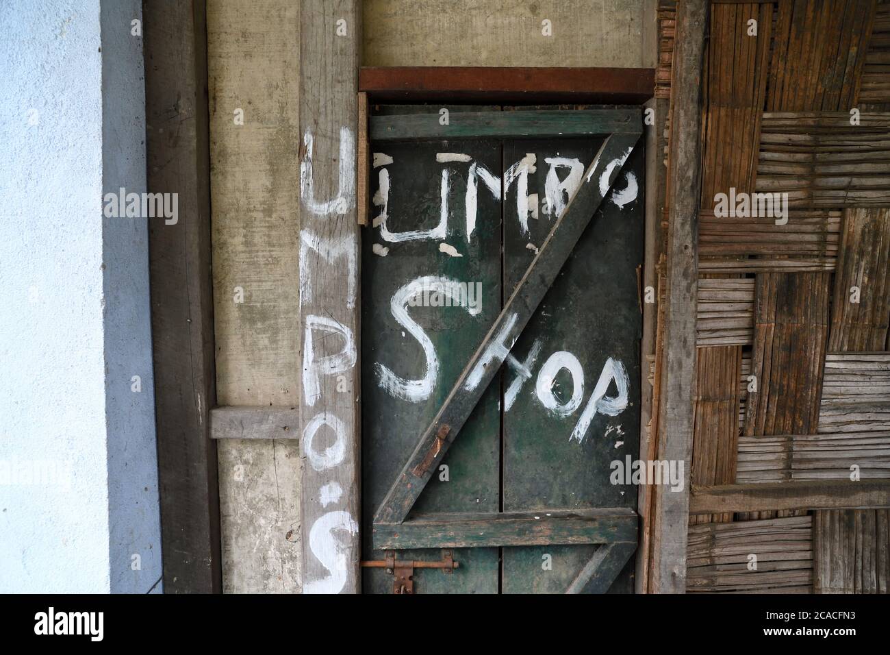 Shuttered roadside shop Stock Photo - Alamy