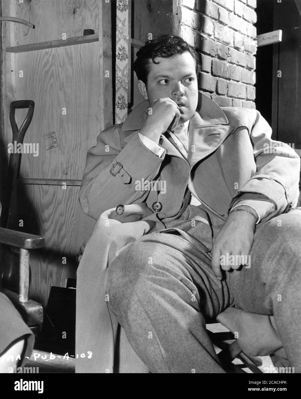 ORSON WELLES on set candid during filming of THE MAGNIFICENT AMBERSONS ...