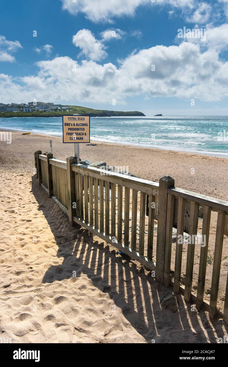 Warning sign on the handrail leading down to Fistral Beach in Newquay ...