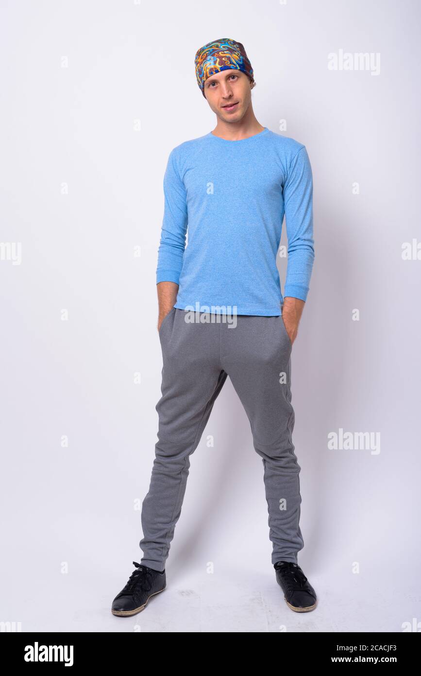 Portrait of man wearing beanie against white background Stock Photo - Alamy