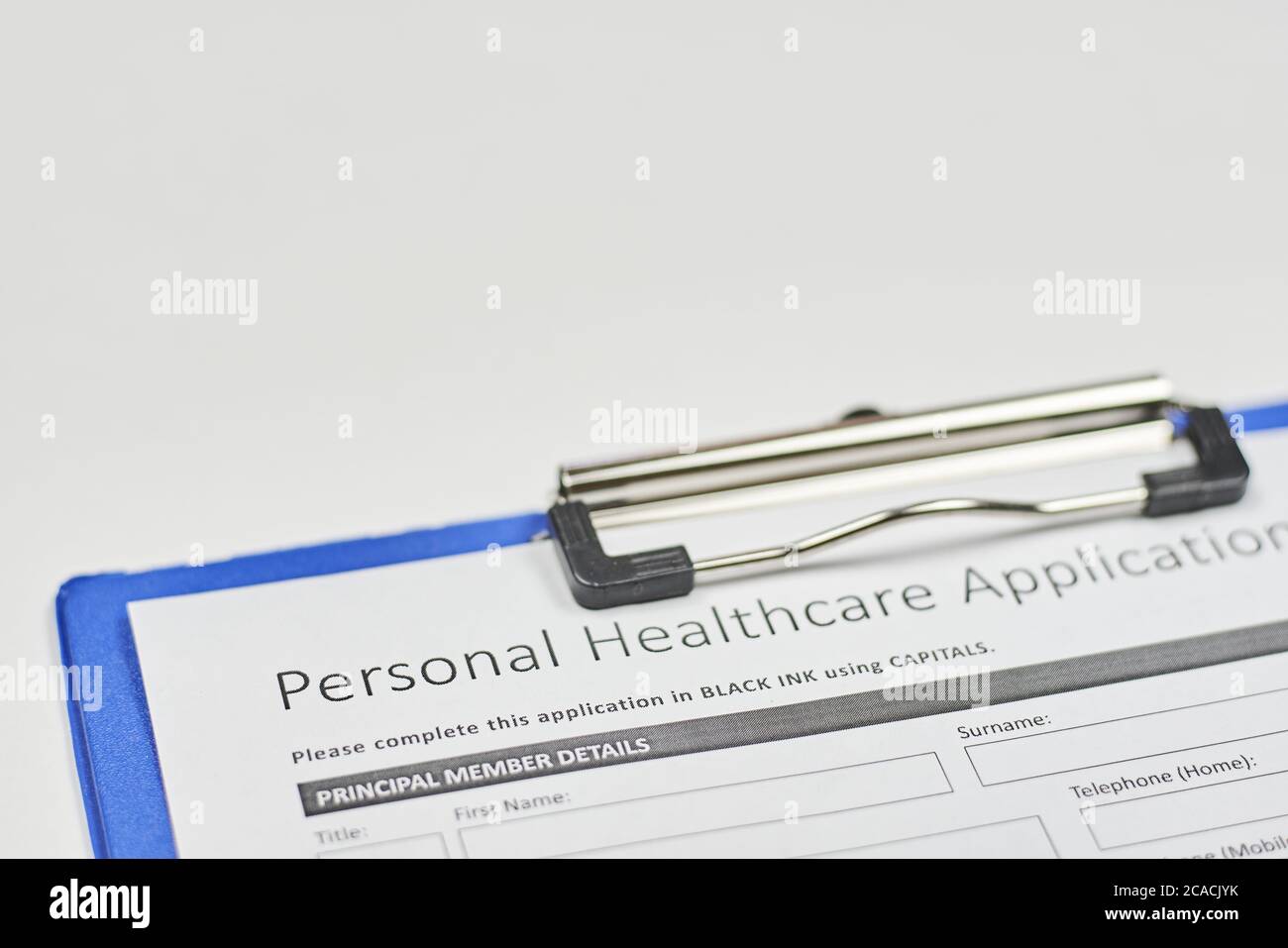 Closeup shot of a personal healthcare insurance application document ...