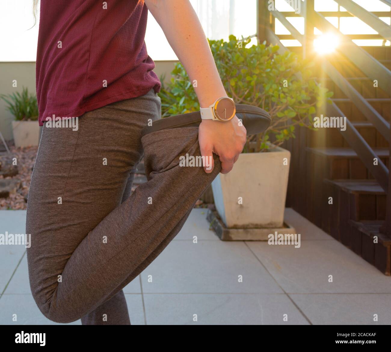 Woman wearing heart hate monitor watch stretching his leg Stock Photo ...