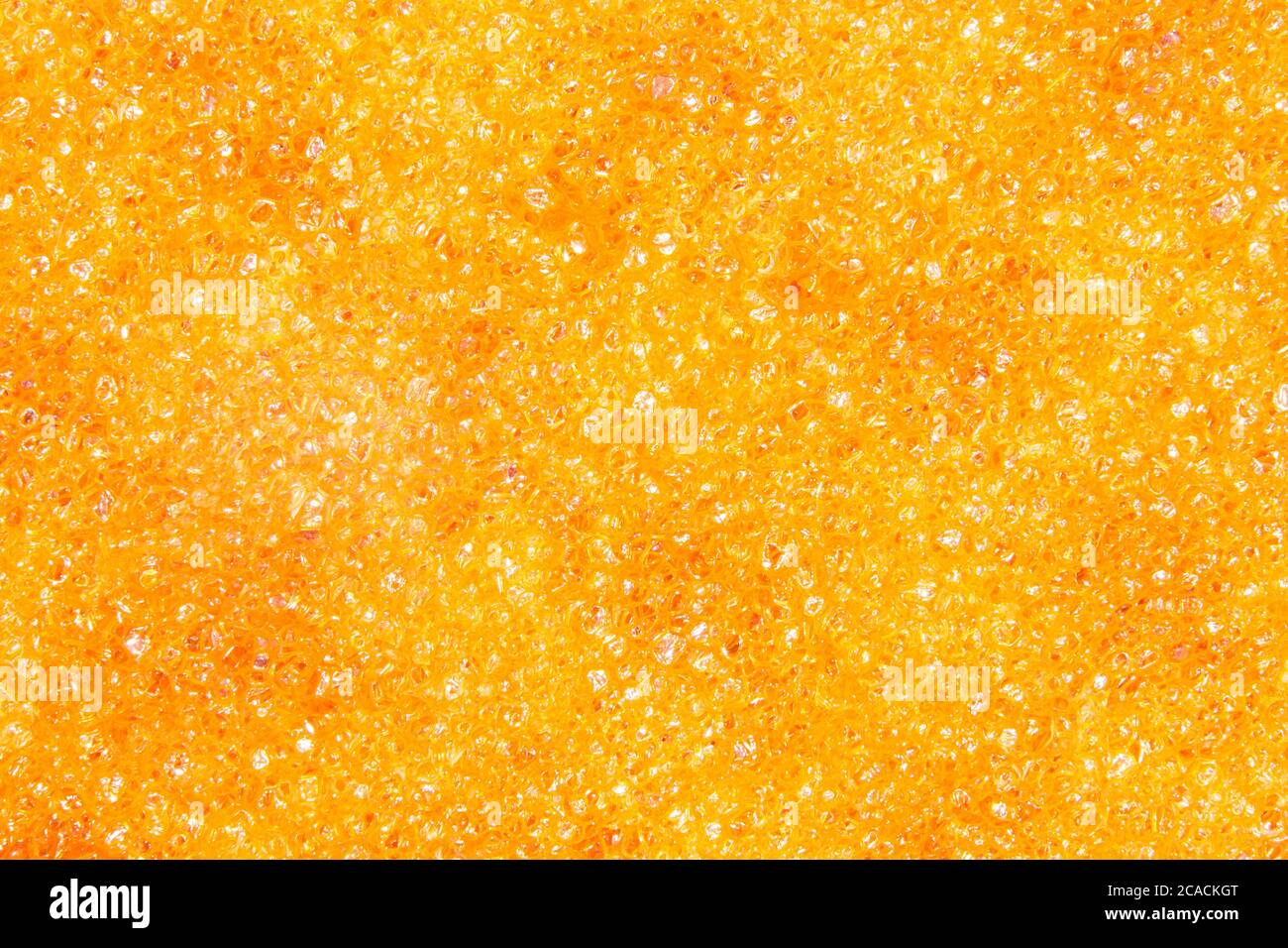 image background slice texture foam rubber orange Stock Photo - Alamy