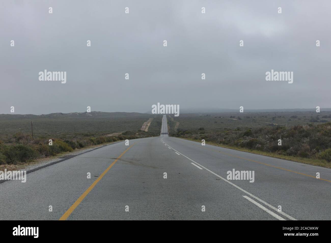Dramatic straight asphalt road hi-res stock photography and images - Alamy