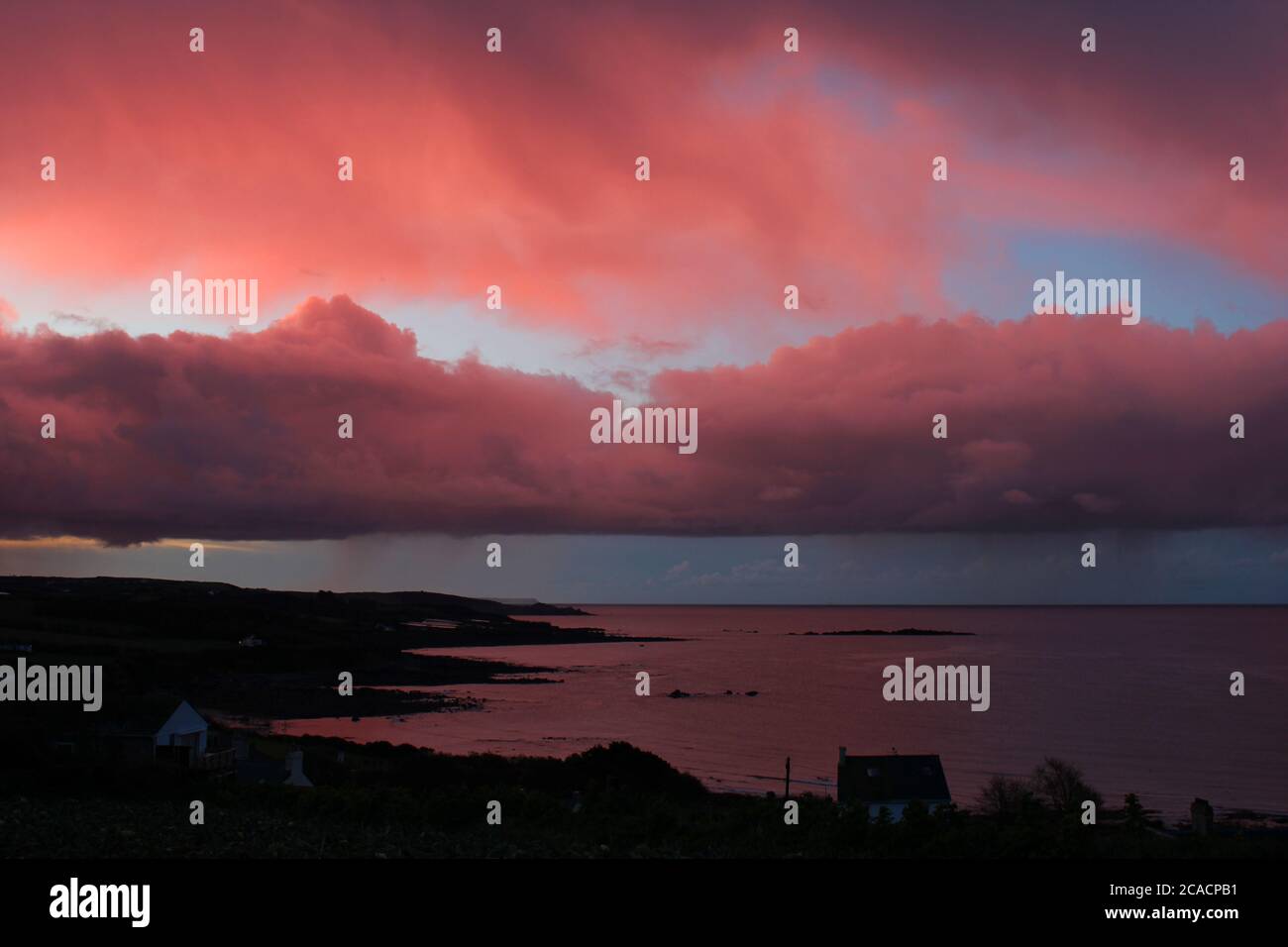 Pink sky over coast hi-res stock photography and images - Alamy