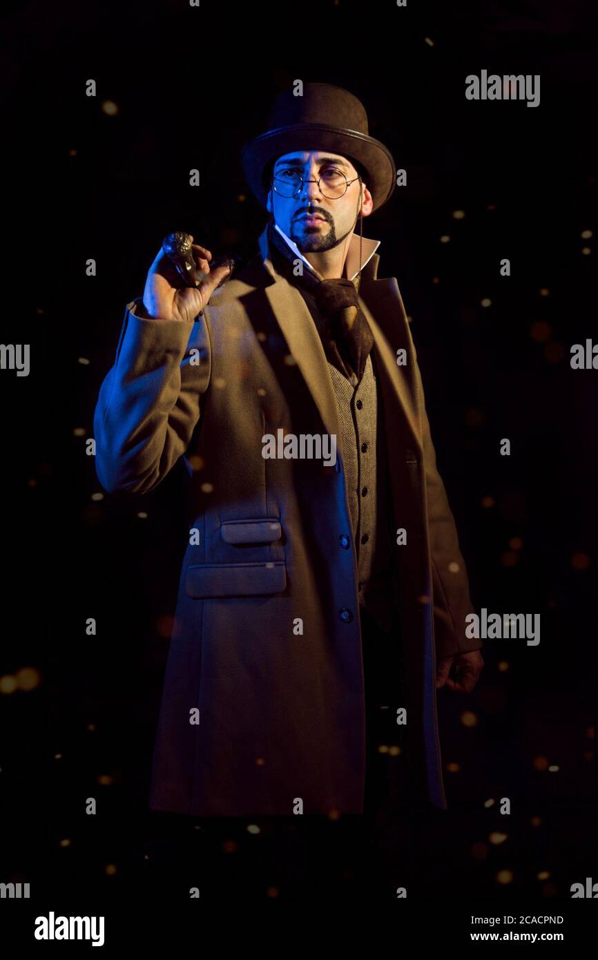 Portrait of a Victorian Man Standing with black background Stock Photo ...